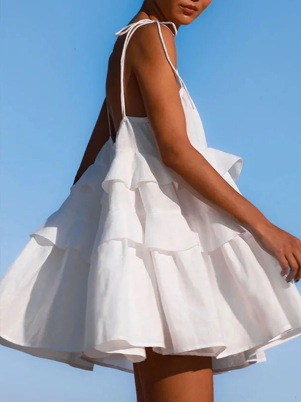 High-Waisted Backless Layered Pleated Mini Dress with Tied Spaghetti Straps